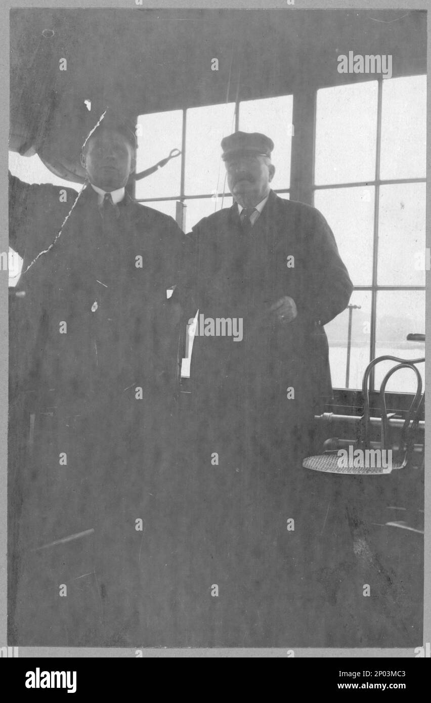 Two men inside boat. Frank and Frances Carpenter collection , Gift; Mrs ...