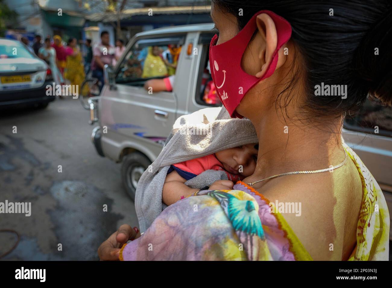 Kolkata, India. 02nd Mar, 2023. A mother with her child come for ...