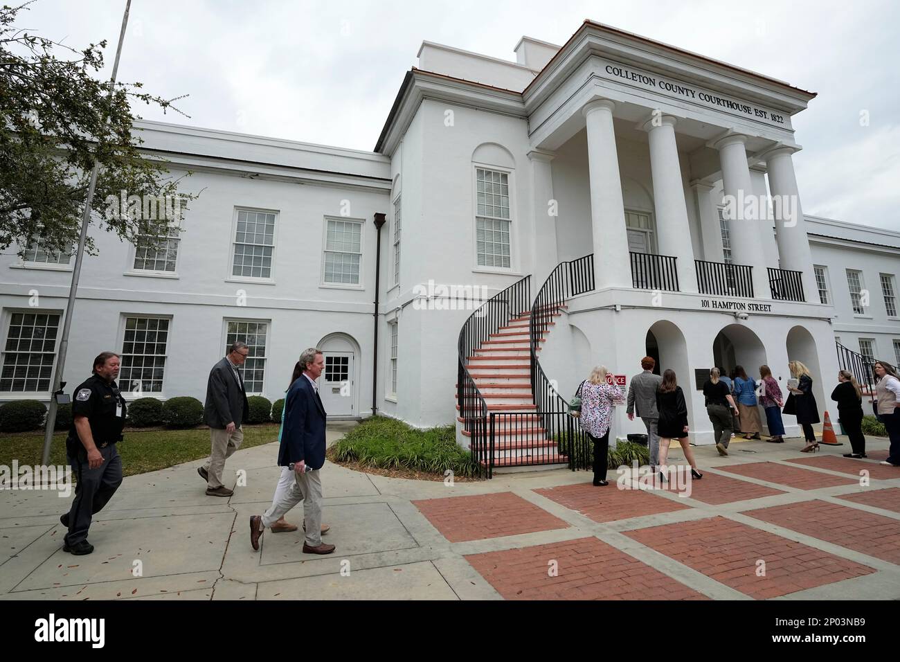 Members of the media and general public gathered outside the Colleton ...