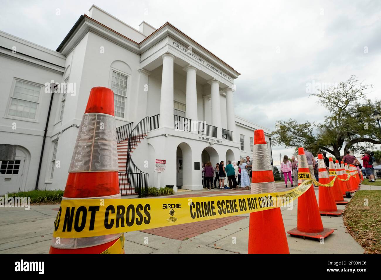 Members of the media and general public gathered outside the Colleton ...