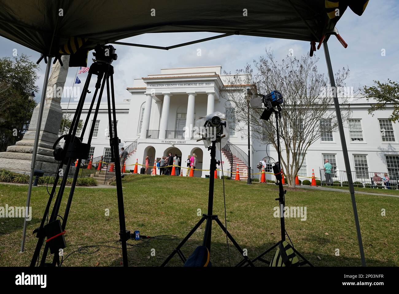 Members of the media and general public gathered outside the Colleton ...