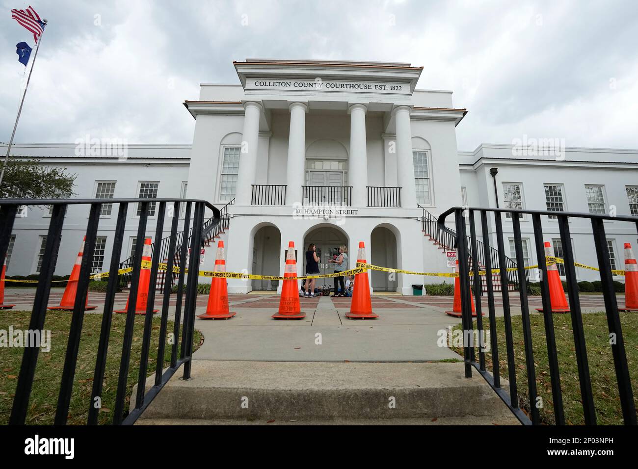 Members of the media and general public gathered outside the Colleton ...