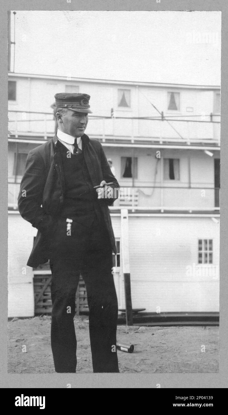 Uniformed man smoking a cigar. Frank and Frances Carpenter collection ...