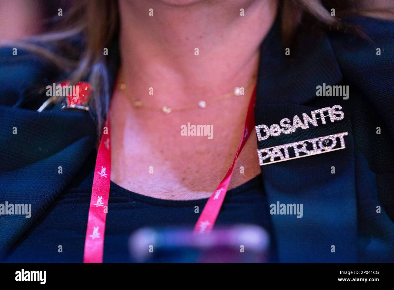 A woman attending the Conservative Political Action Conference, CPAC ...