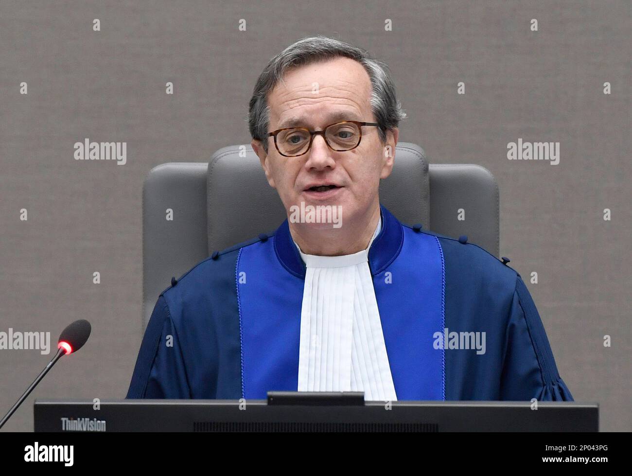 Presiding Judge Marc Perrin de Brichambaut opens the court session ...