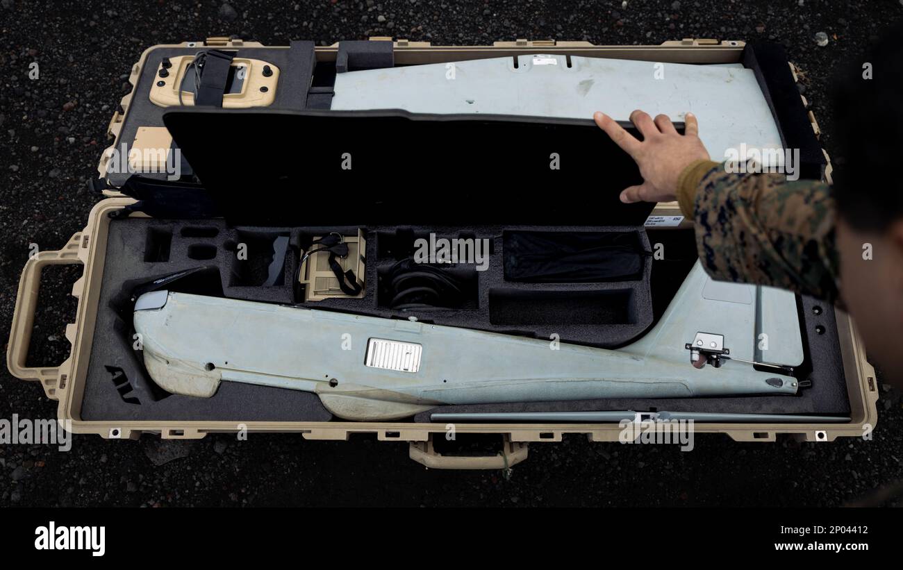 U.S. Marines with 3d Battalion, 4th Marines prepare to train with an RQ ...