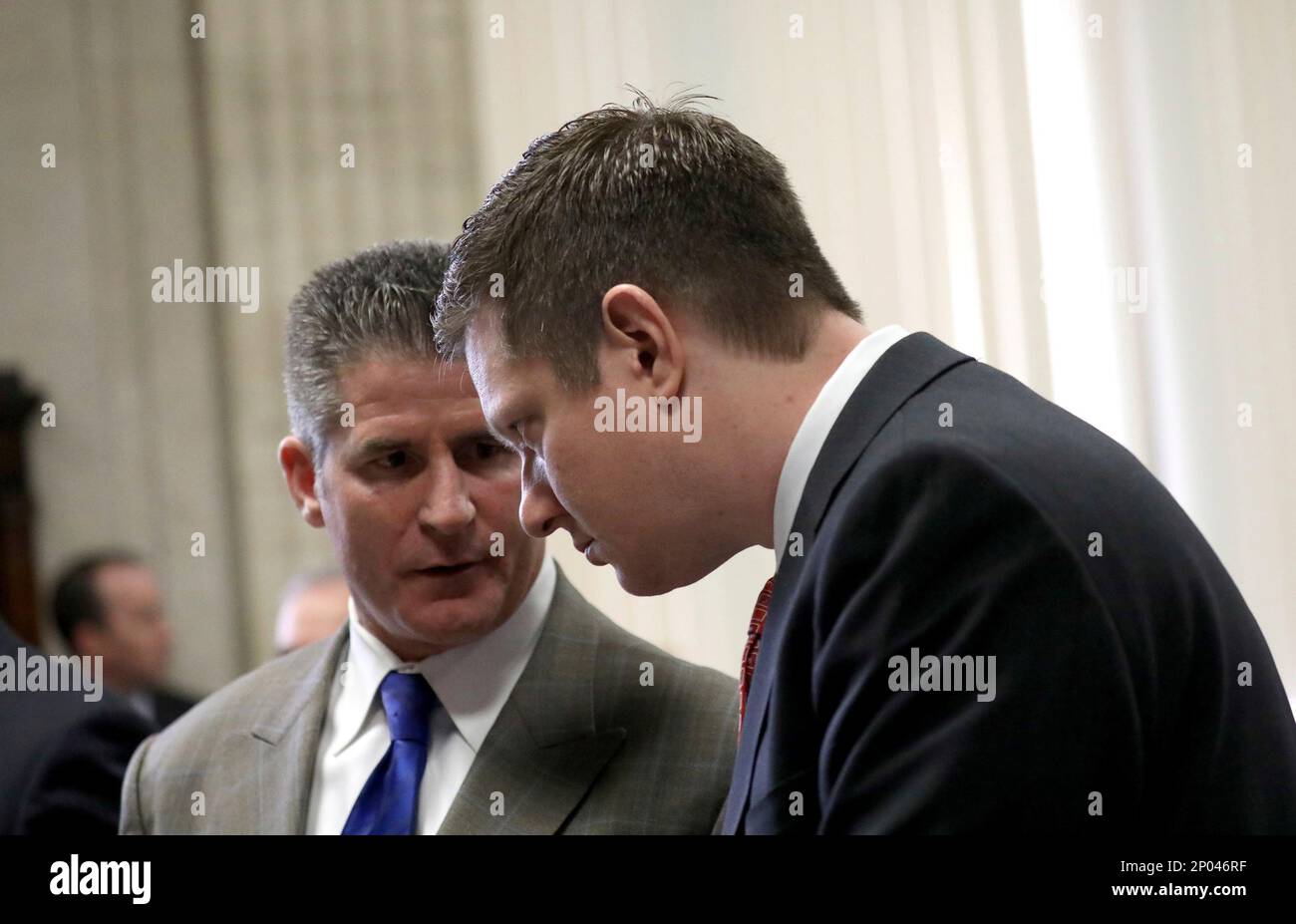 Former Chicago Police Officer Jason Van Dyke, right, confers with his ...