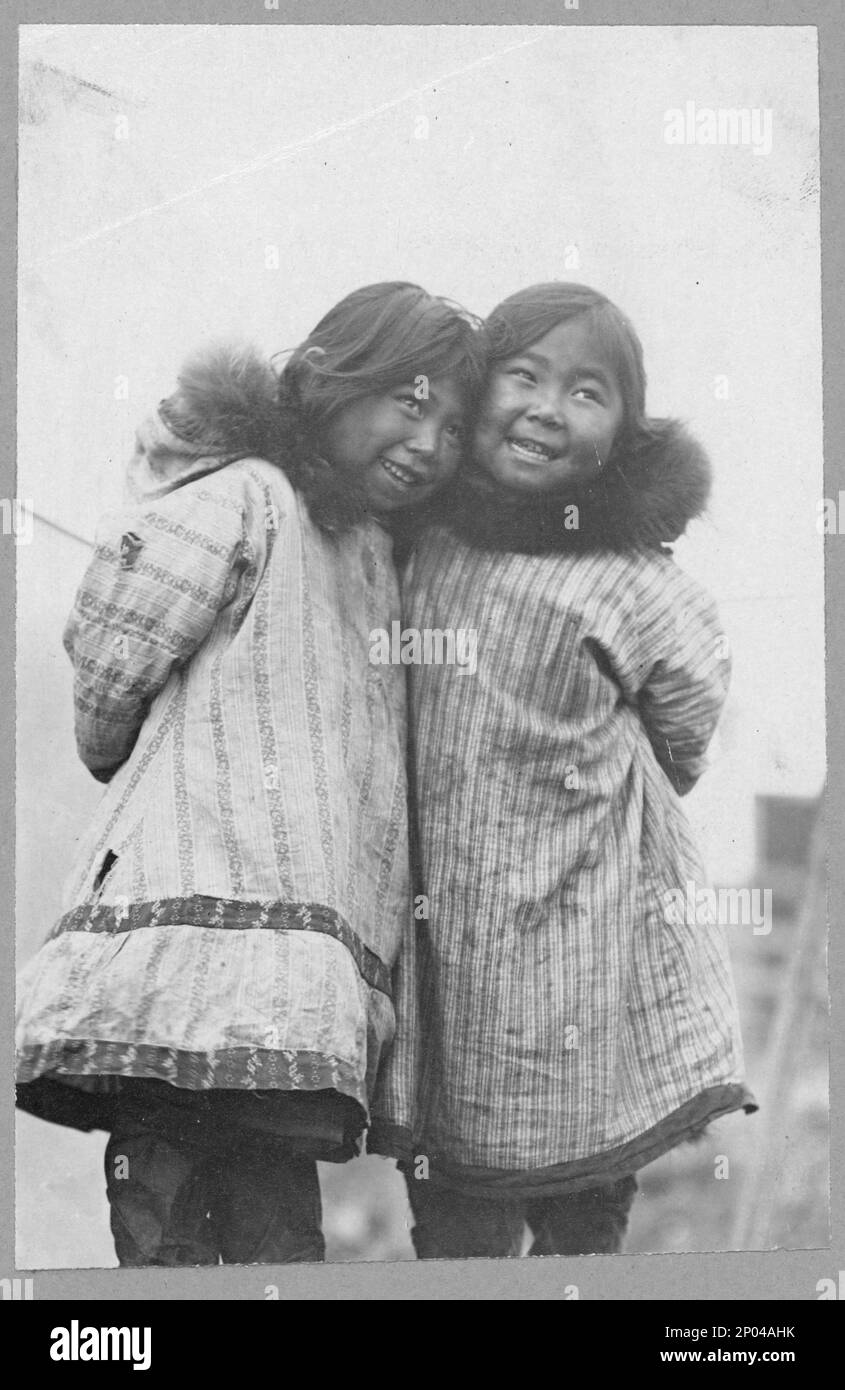 Two Eskimo girls standing side by side. Frank and Frances Carpenter ...