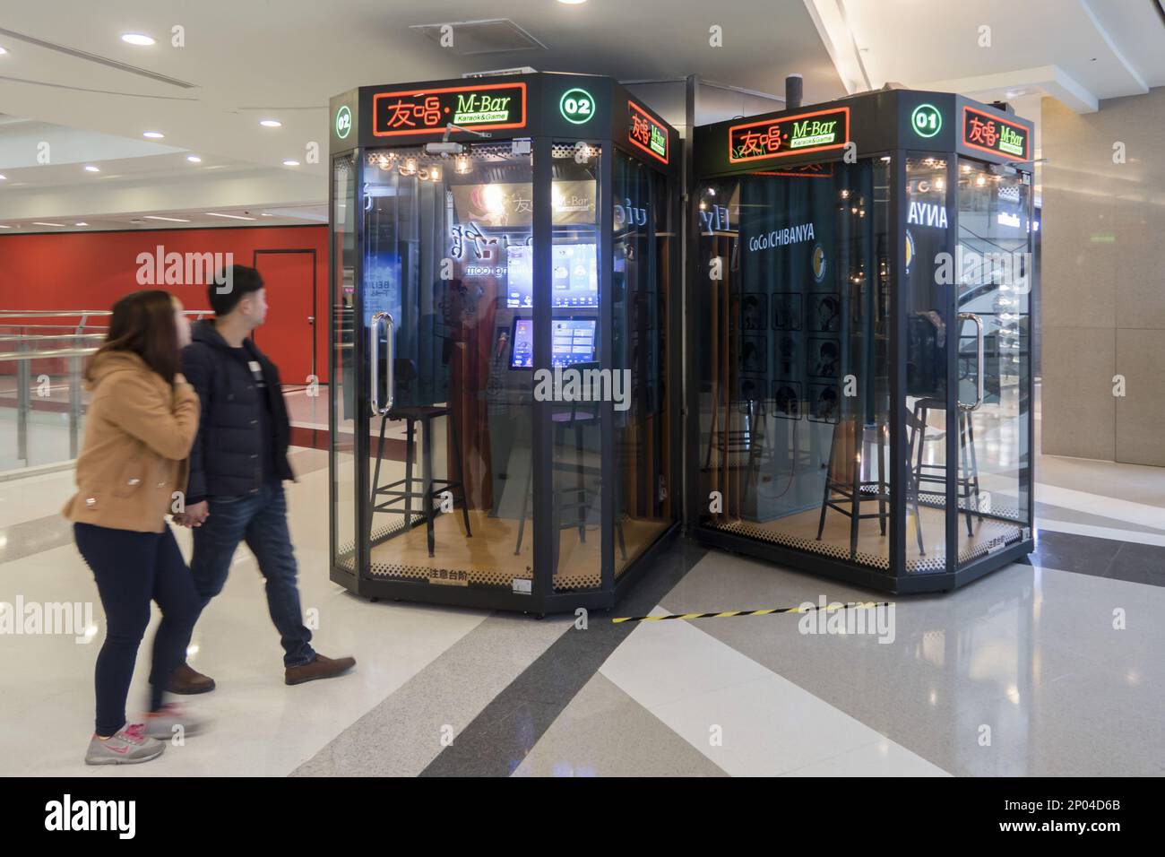 Two phone-booth- sized self-service mini KTV huts appear at the Raffles ...
