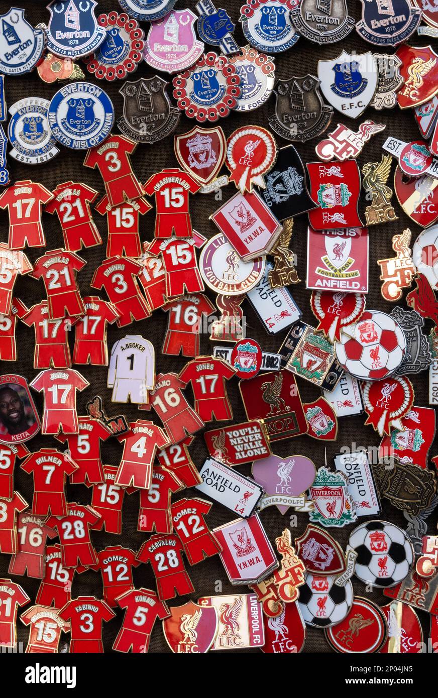 Fan pins for LFC and EFC in Liverpool Stock Photo - Alamy