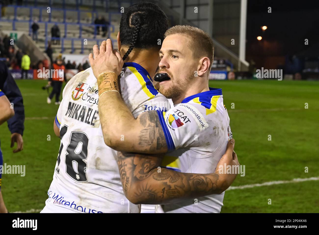 Matt Dufty #1 of Warrington Wolves and Tom Mikaele #18 of Warrington ...