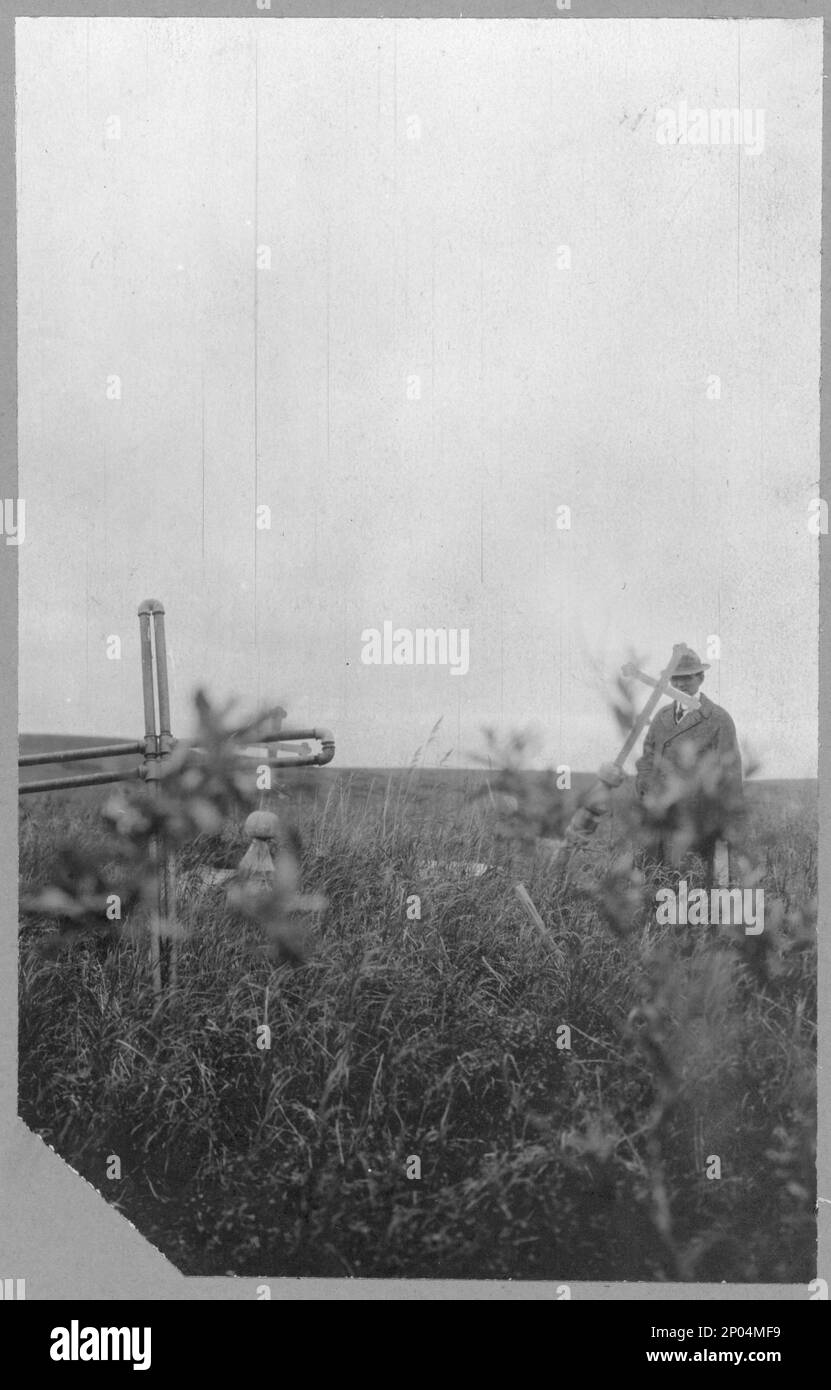 Tombstones in a field. Frank and Frances Carpenter collection , Gift ...