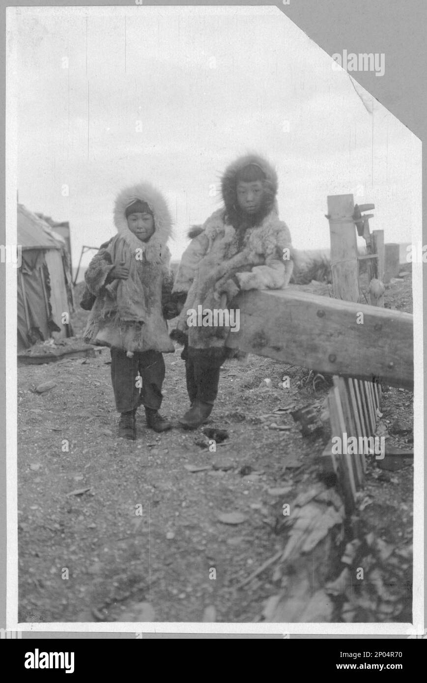 Two eskimo boys Black and White Stock Photos & Images - Alamy