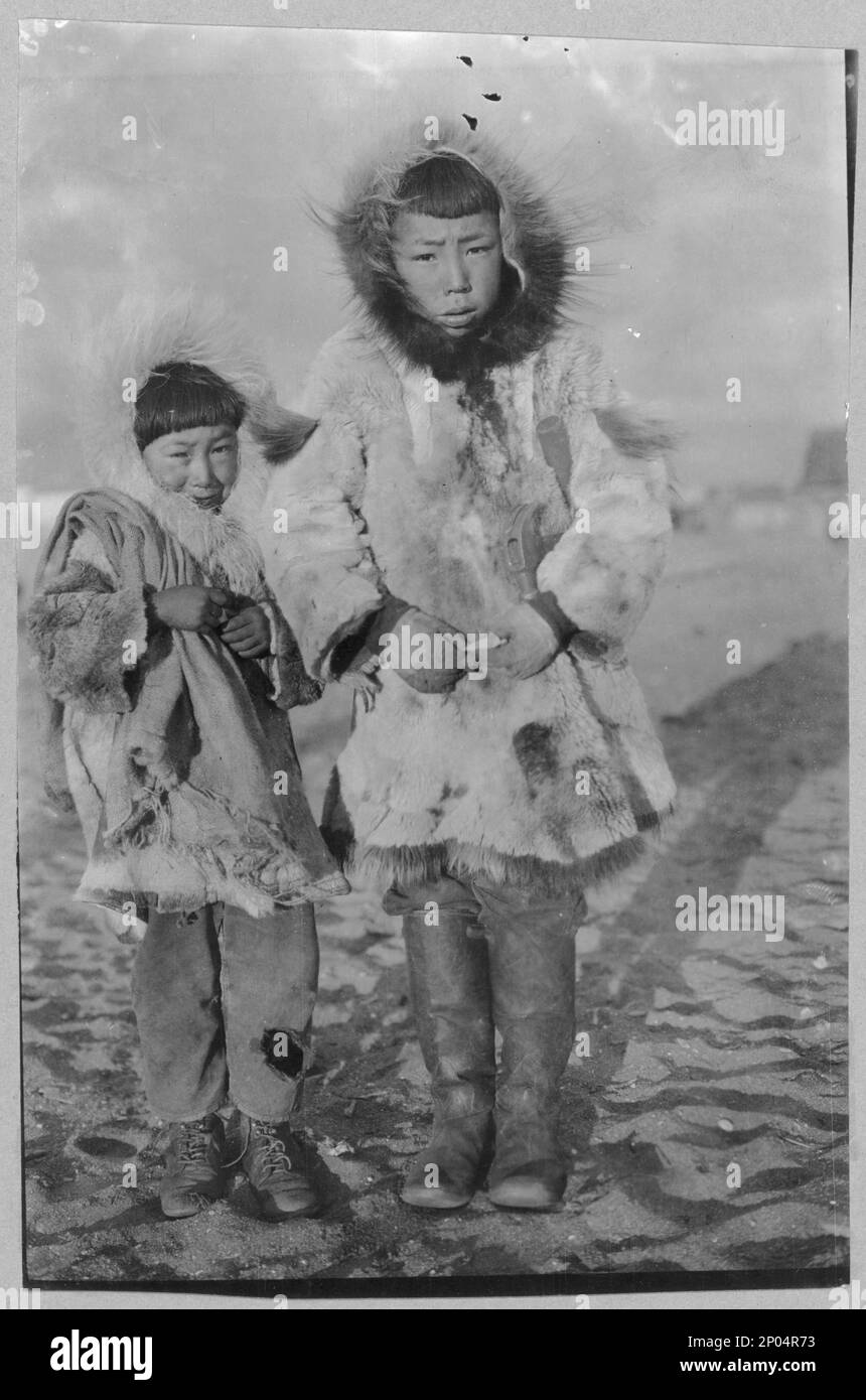 Two eskimo boys Black and White Stock Photos & Images - Alamy