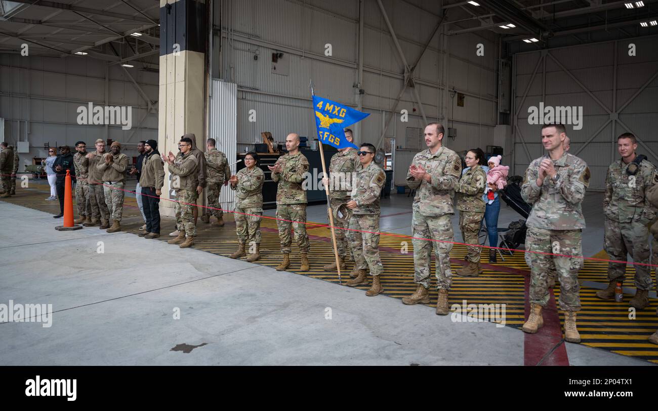 Members of the 4th Maintenance Group cheer on their squadrons during a quarterly load crew ...