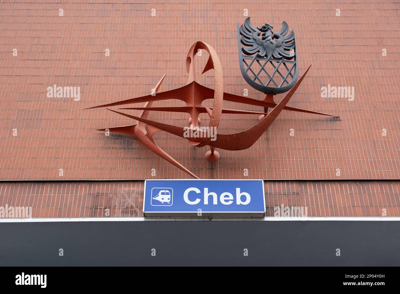 Cheb, CZ - 18 January 2023: iron sculpture Above entry to Main train ...