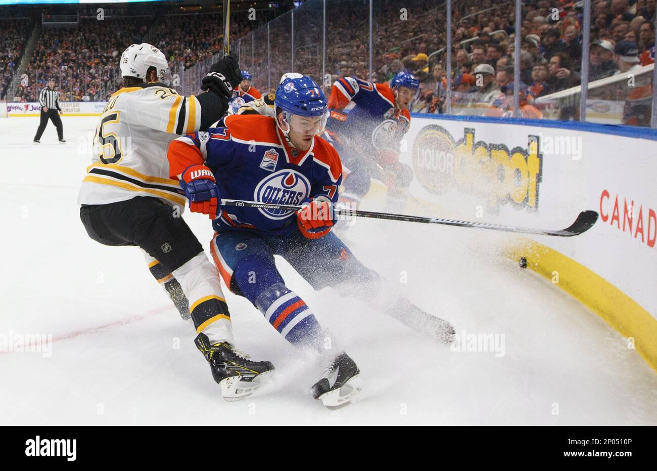 Boston Bruins' Brandon Carlo (25) and Edmonton Oilers' Oscar Klefbom ...