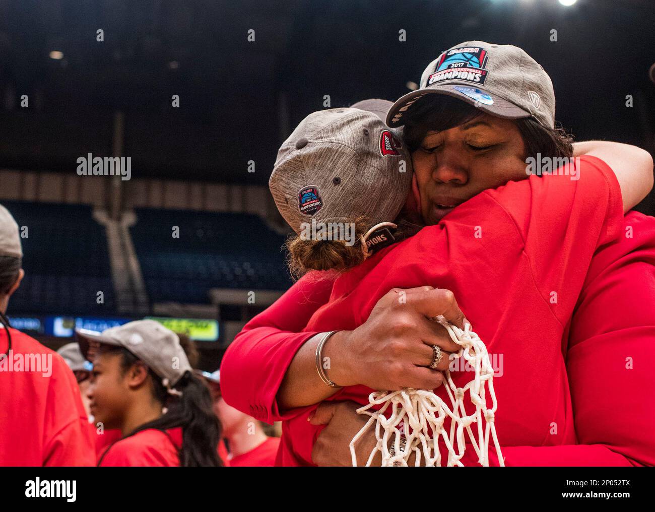Western Kentucky Lady Toppers head coach Michelle Clark-Heard hugs ...