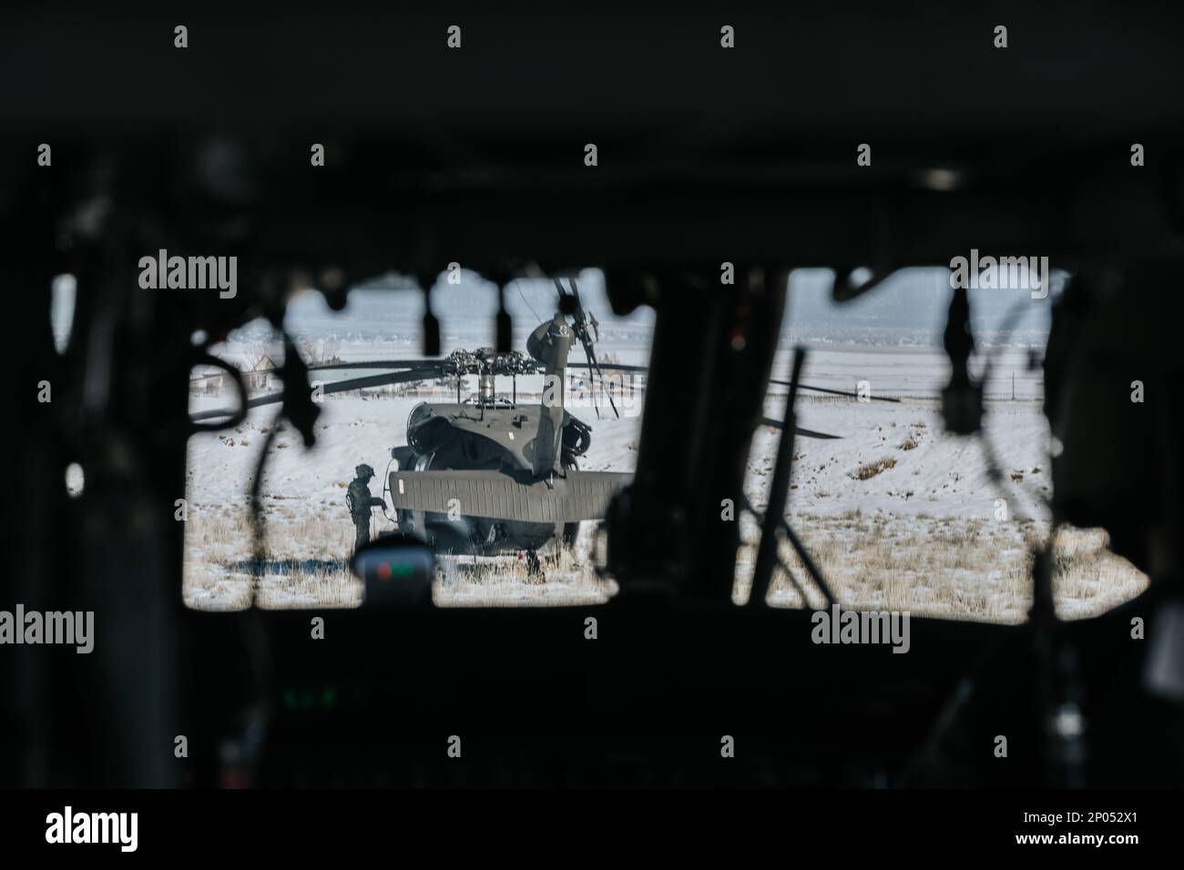 A U.S. Army Crew chief assigned to the 1-211th Aviation Battalion, Utah ...