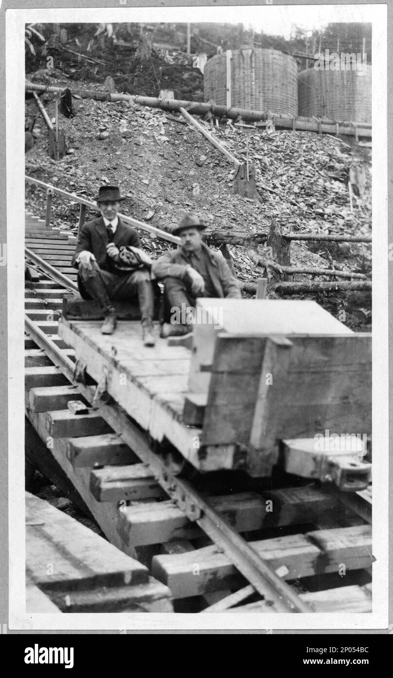 Frank G. Carpenter and man sitting on tracks. Frank and Frances ...