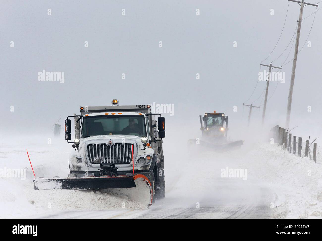 Virginia Department of Transportation snow plows cut through drifting ...