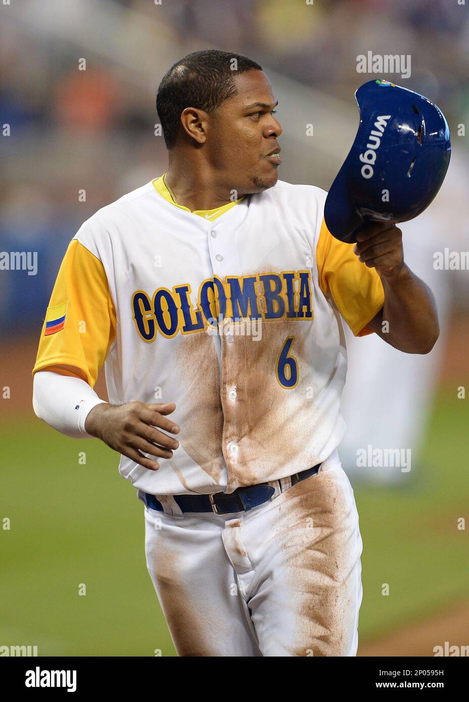MIAMI, FL - MARCH 12: Colombia infielder Reynaldo Rodriguez (6) scores ...