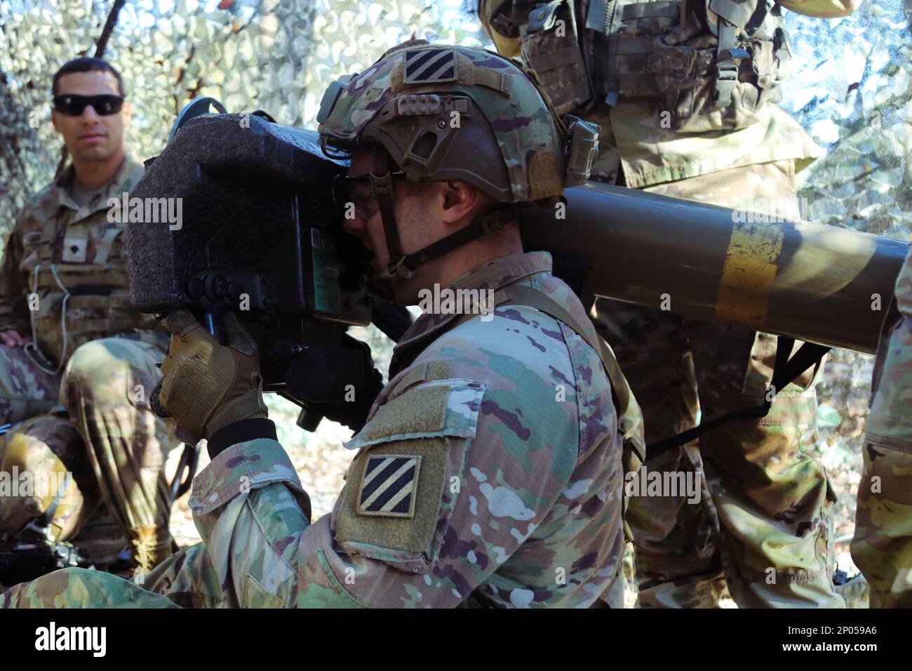 A Soldier assigned to the 3rd Infantry Division performs the proper pre ...