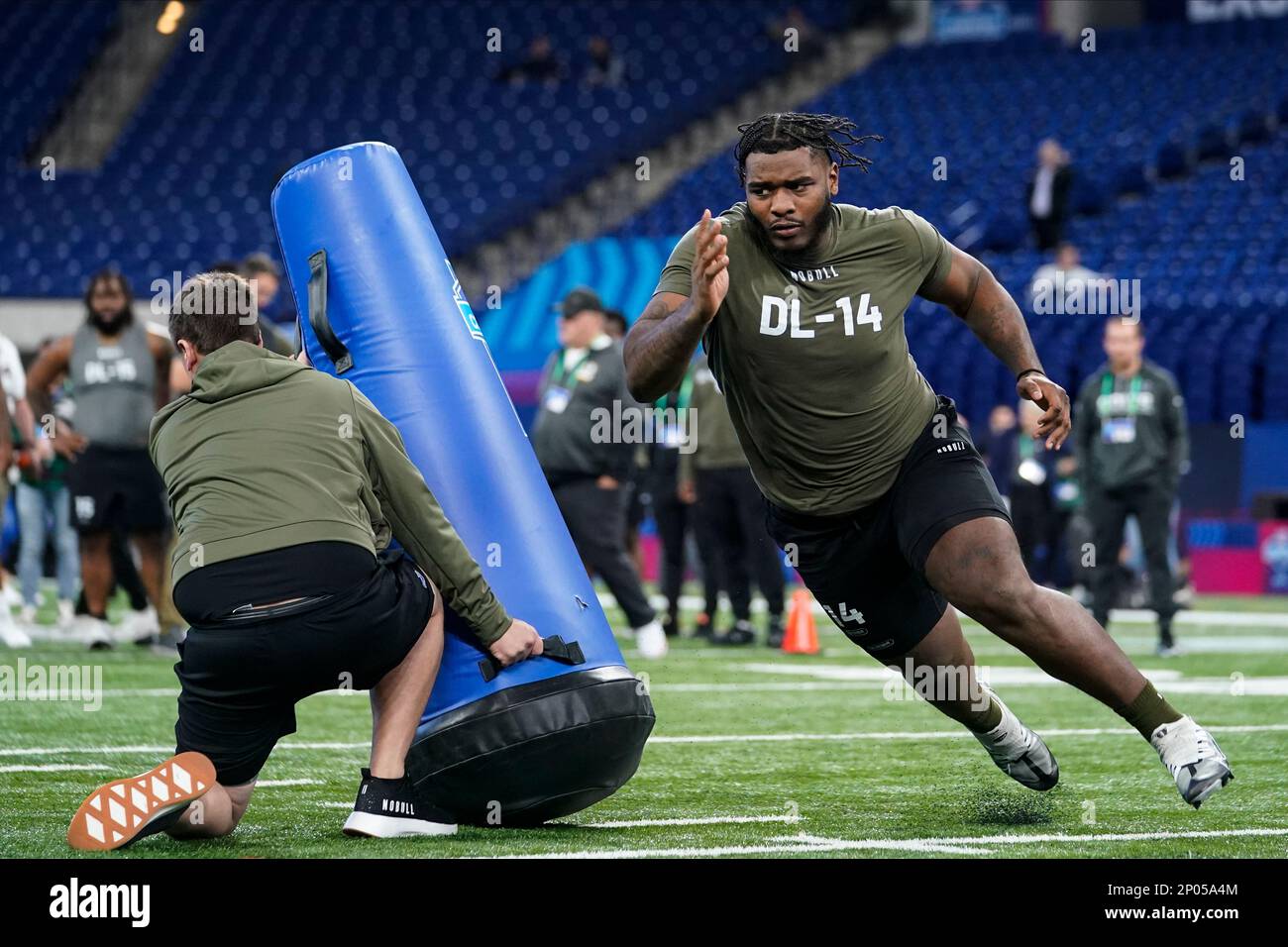 LSU defensive lineman Jaquelin Roy runs a drill at the NFL football ...