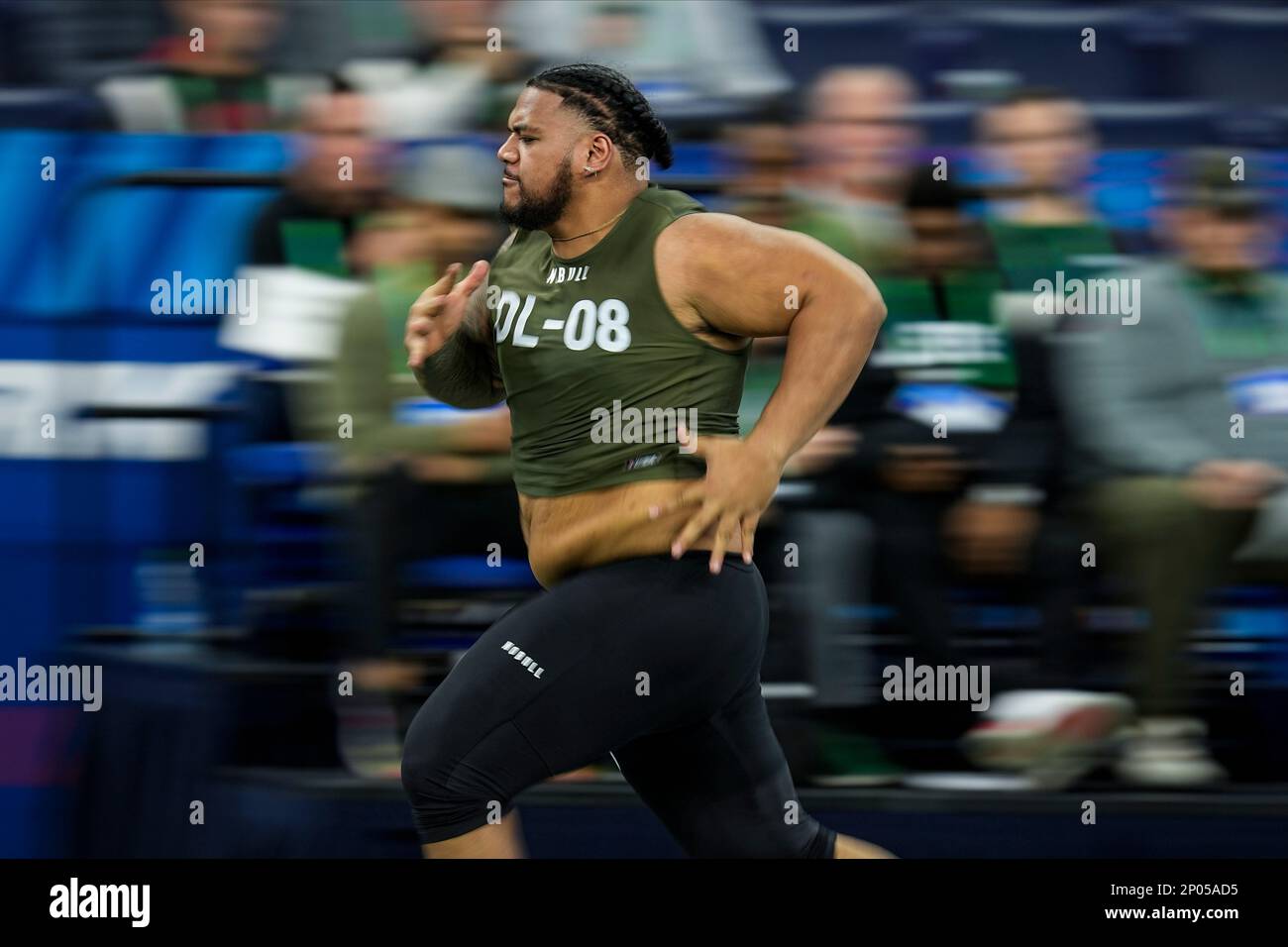 Baylor defensive lineman Siaki Ika runs a drill at the NFL football ...