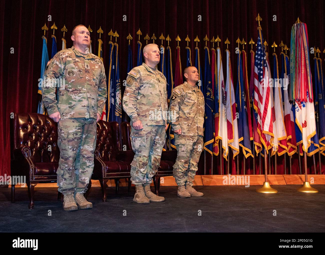 U.S. Army Lt. Gen. John R. Evans, center, commanding general, Command Sgt. Maj. Phil K. Barretto ...