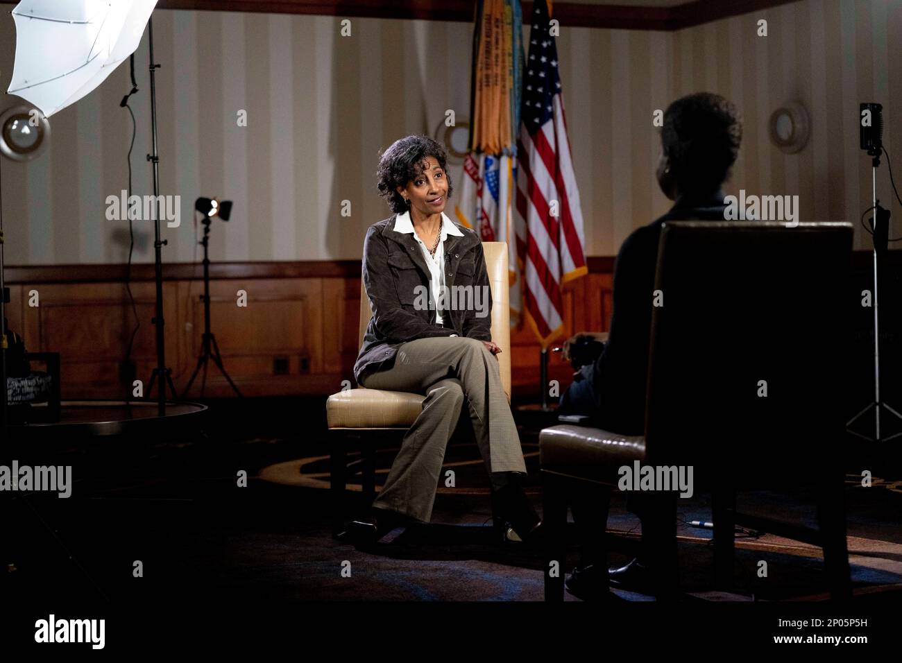 Regan Hopper, the daughter of retired Army Col. Paris Davis, one of the ...