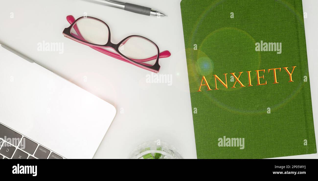 Hand writing sign Anxiety. Internet Concept Excessive uneasiness and ...