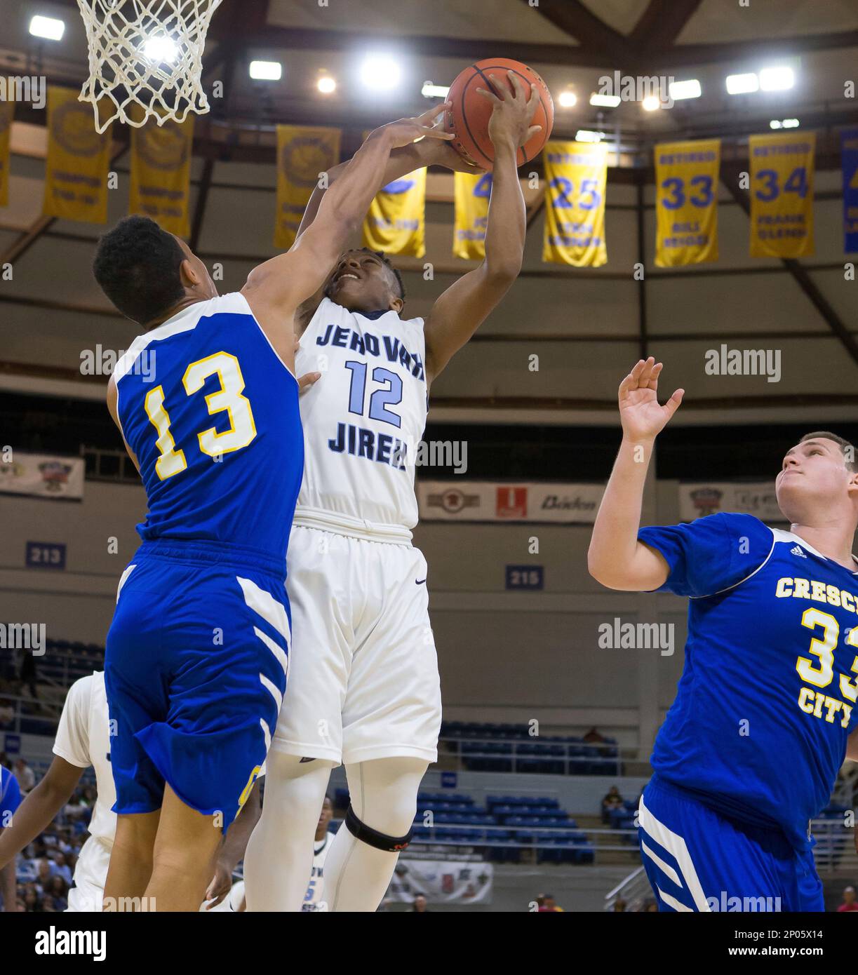 Jehova-Jireh's Ja'Coby Carter (12) is fouled by Crescent City's Kaleo ...