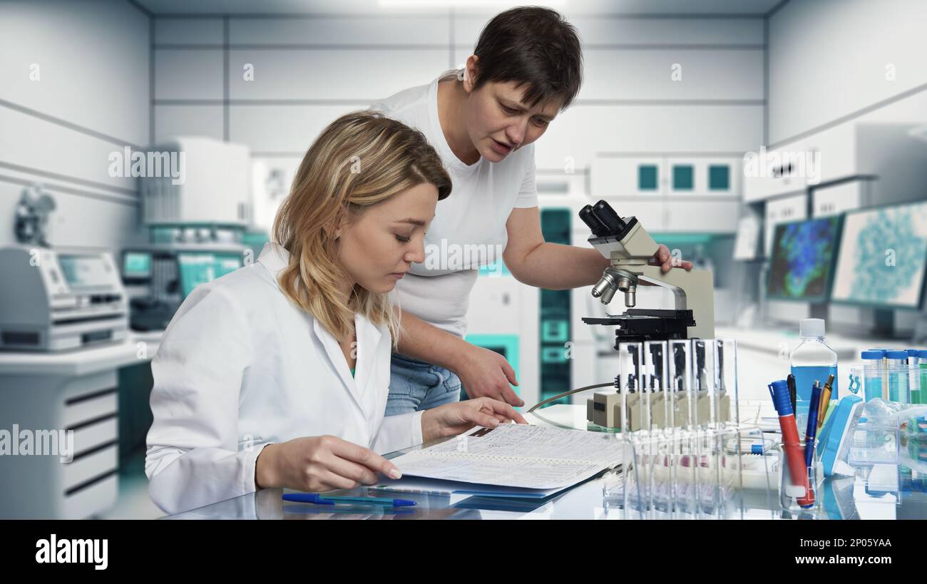 Caucasian female scientists, biologists, biochemists working in ...