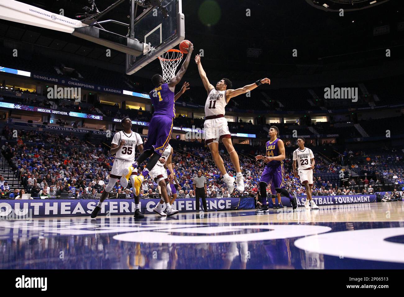 NASHVILLE, TN - MARCH 08: LSU Tigers forward Duop Reath (1) scores with ...