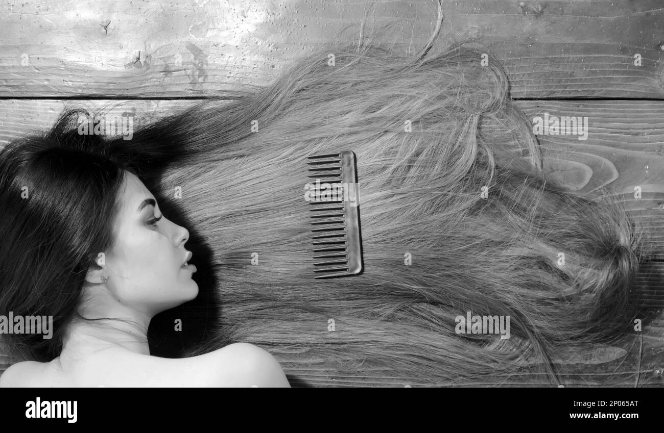 Gorgeous hair. Model with curly hairstyle. Hair salon concept. Care and ...