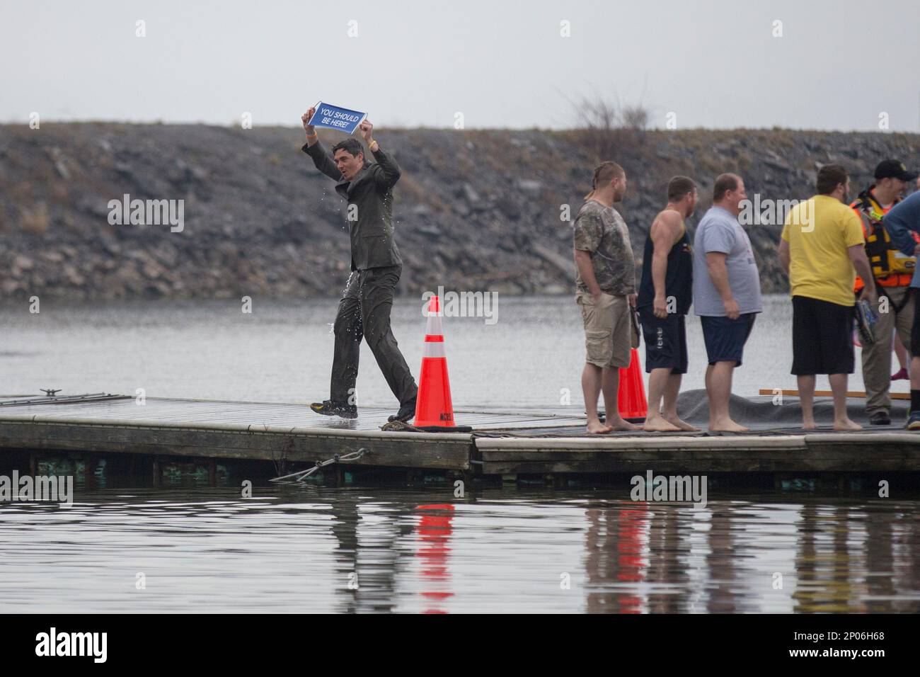 Jordan Harrell of Almo, Ky., holds a sign reading, "You Should be Here ...