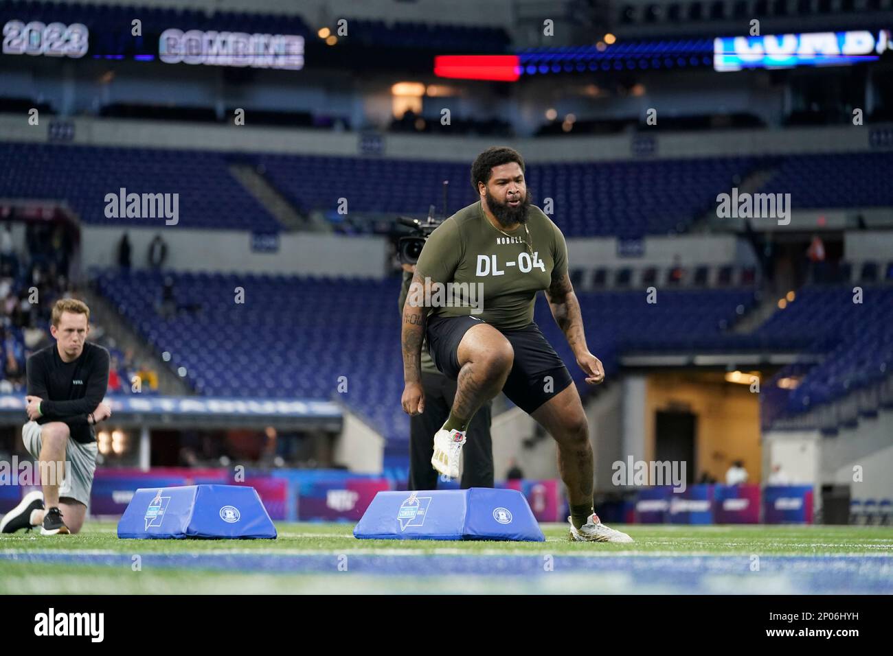 Coastal Carolina defensive lineman Jerrod Clark runs a drill at the NFL ...