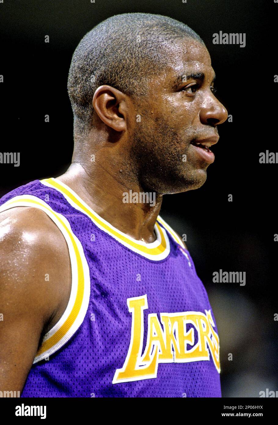 Los Angeles Lakers guard Earvin "Magic" Johnson (32) looks down court ...