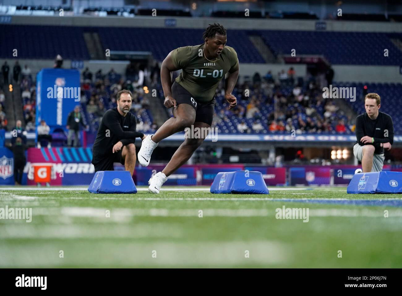 Wisconsin defensive lineman Keeanu Benton runs a drill at the NFL ...