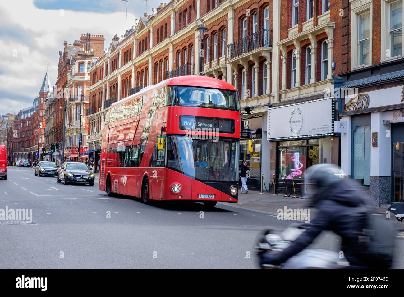 Red Bus in oxford street, London Stock Photo - Alamy