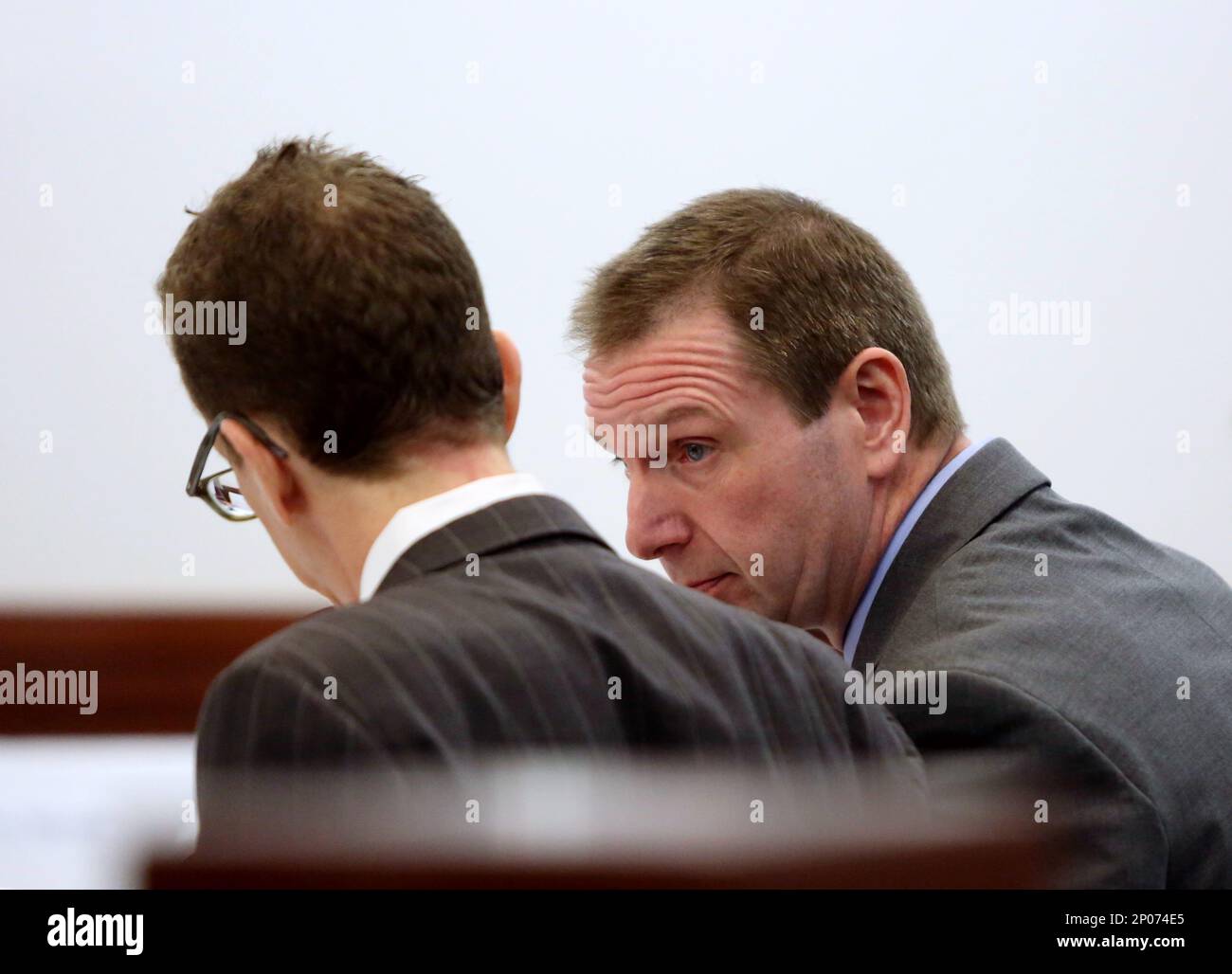 Defense attorney Jon Loevy, left, talks with Curtis Lovelace during ...