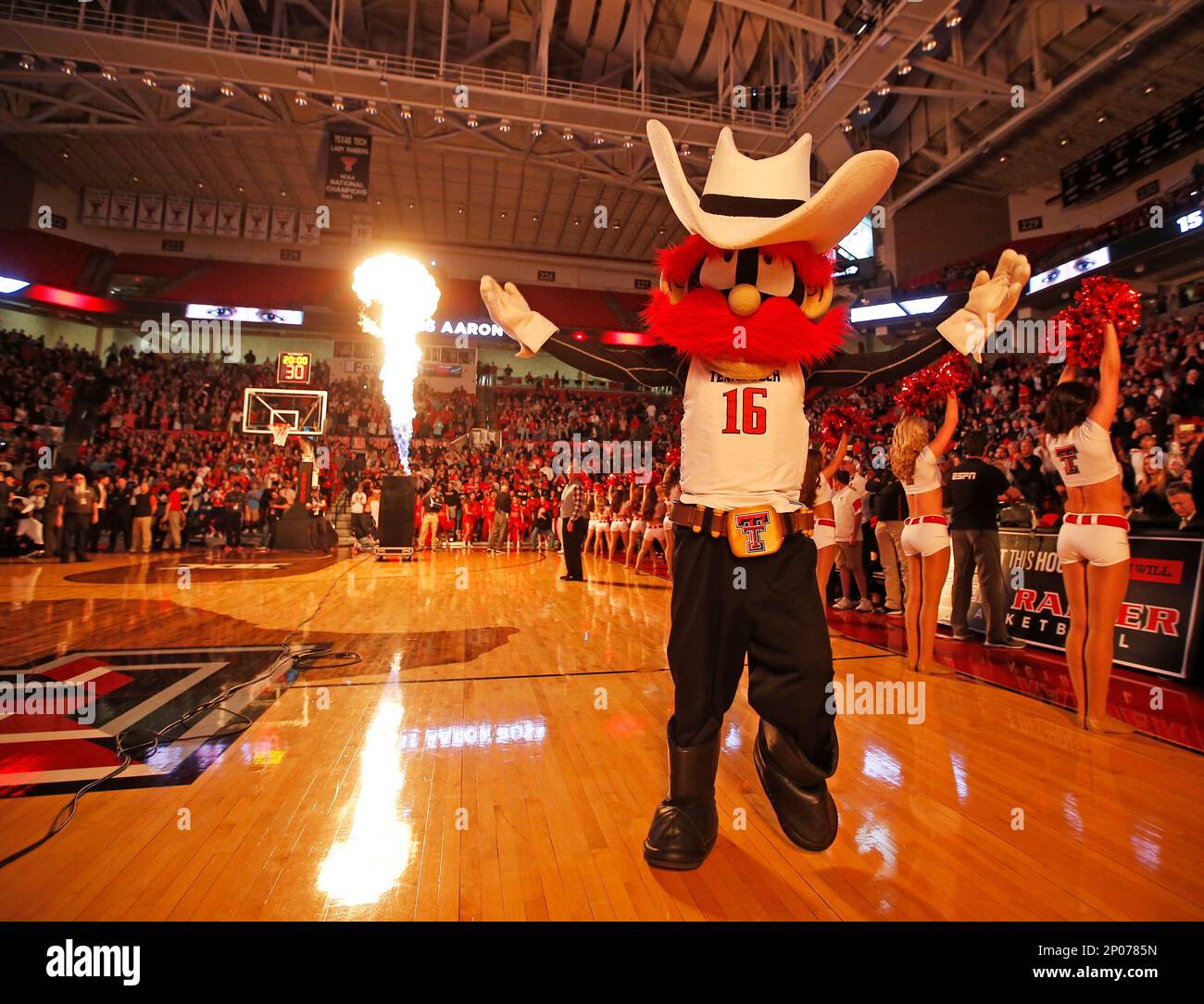 Texas Tech mascot Raider Red raises his arms in the air as the starting ...