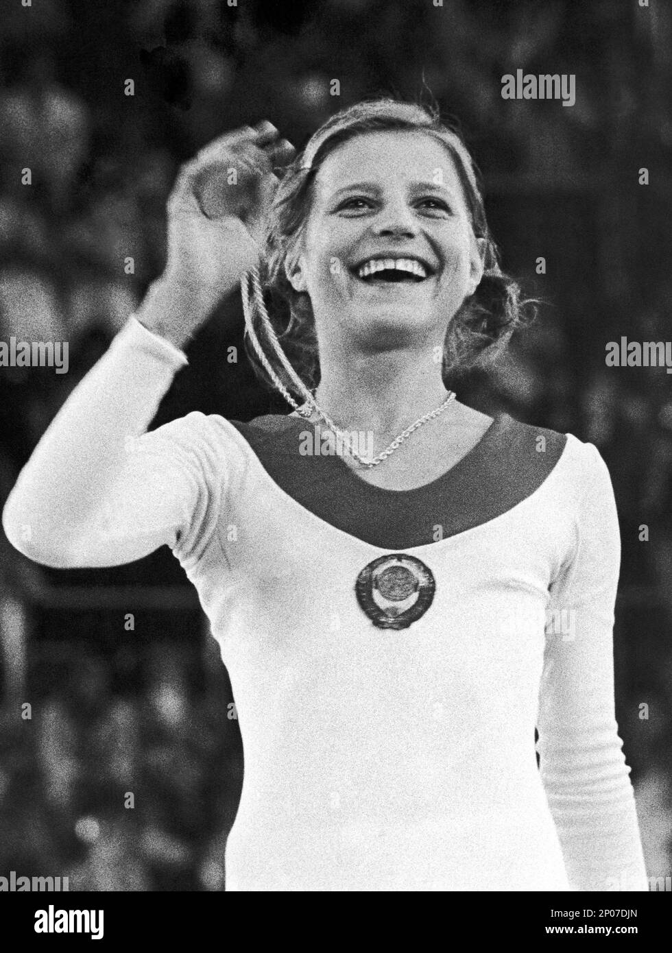 FILE - In this Aug. 31, 1972, file photo, Olga Korbut, USSR, holds up ...