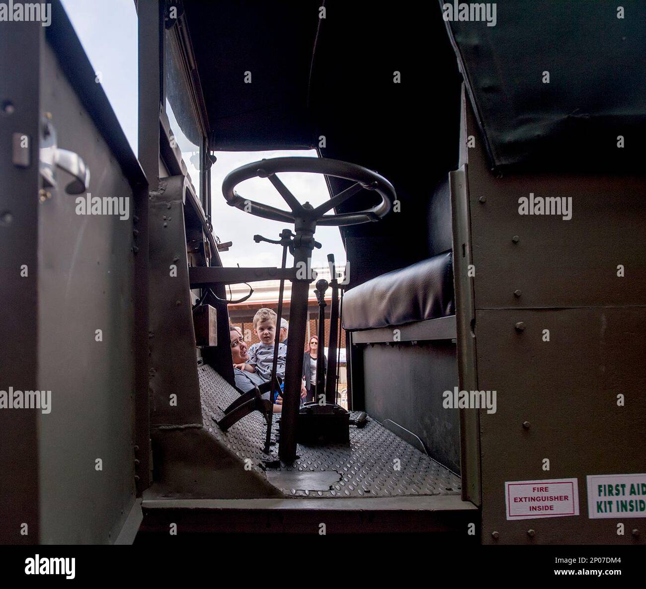Ethan Koleas, 2, peers into the cab of the 1917 Liberty Truck on ...