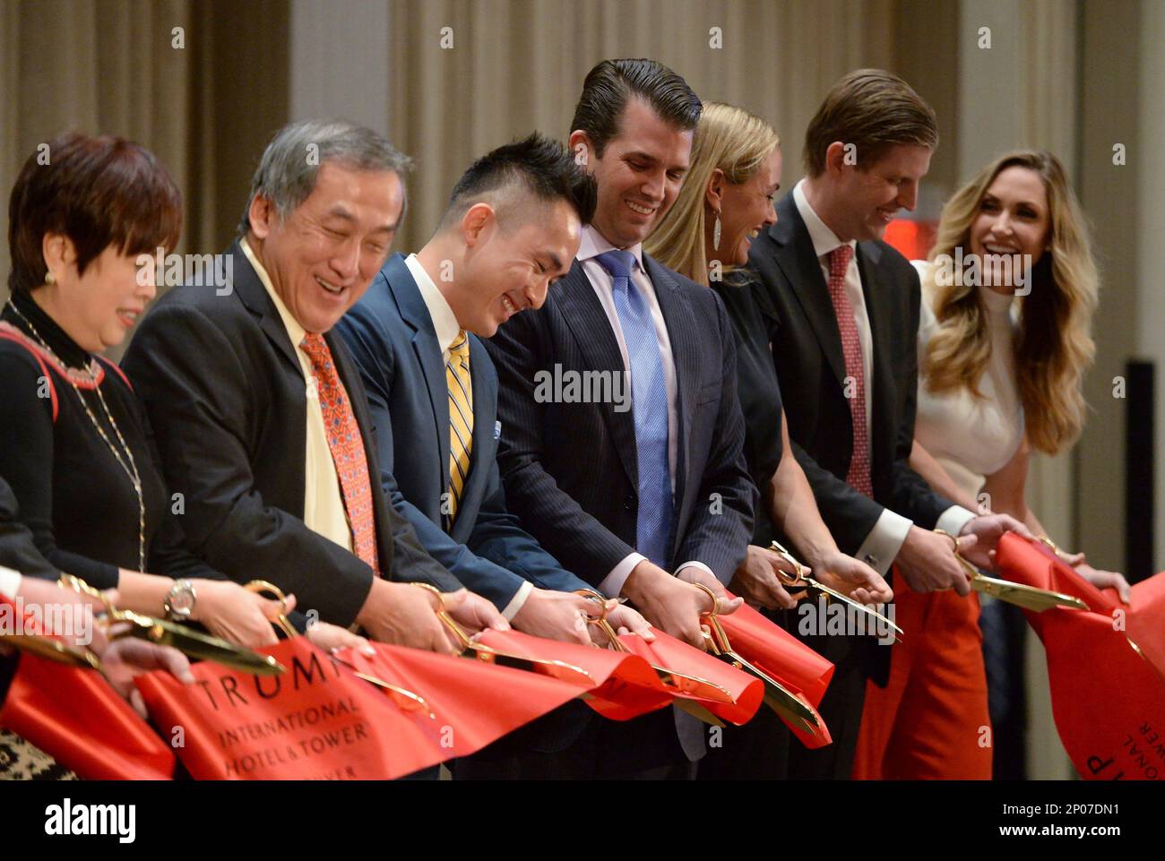 Dignitaries including Malaysian tycoon Tony Tiah (second from left ...