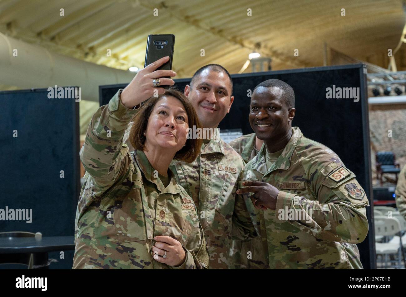 Chief Master Sgt. of the Air Force JoAnne S. Bass pose with Airmen for ...