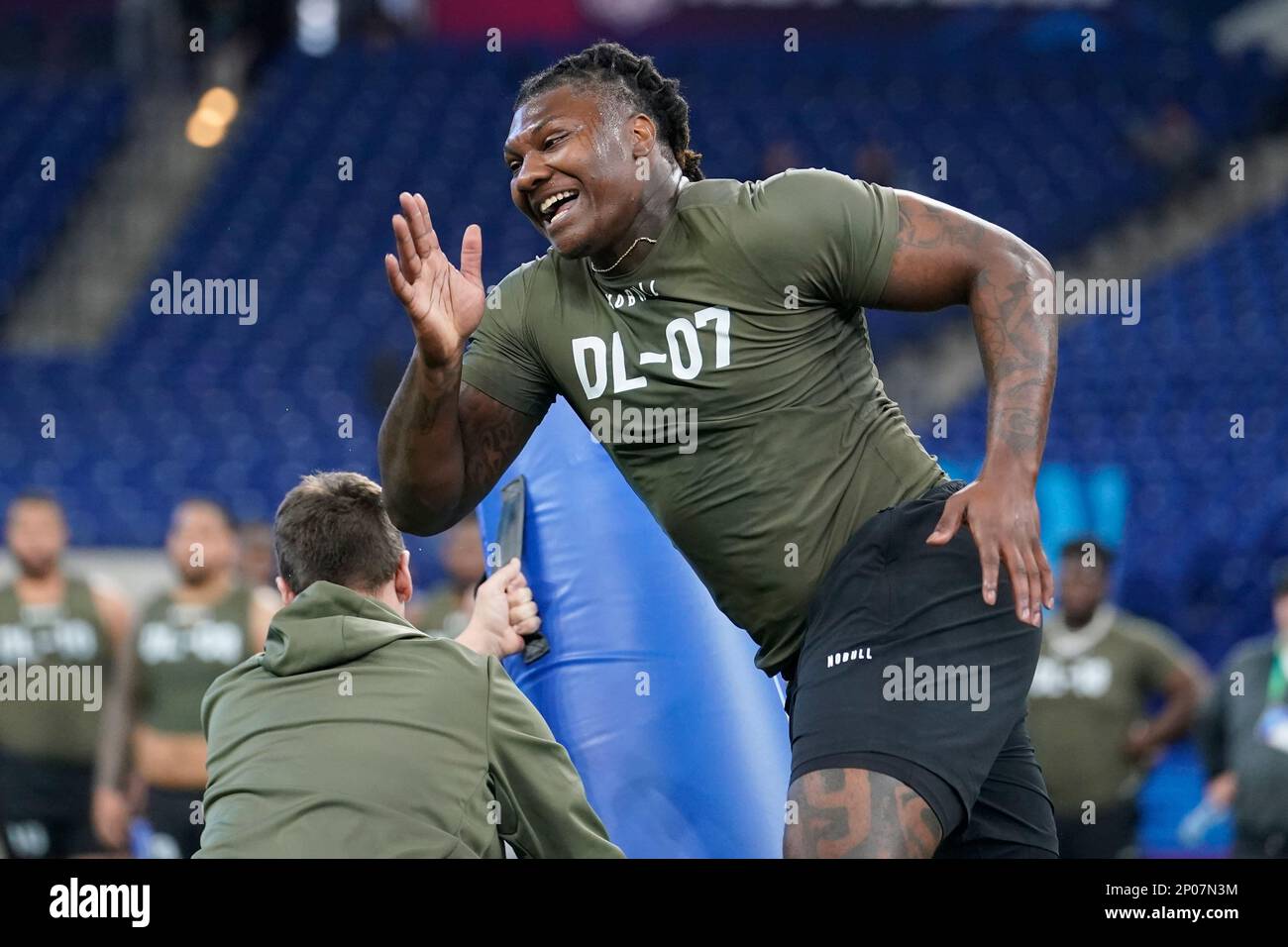 Florida defensive lineman Gervon Dexter runs a drill at the NFL ...