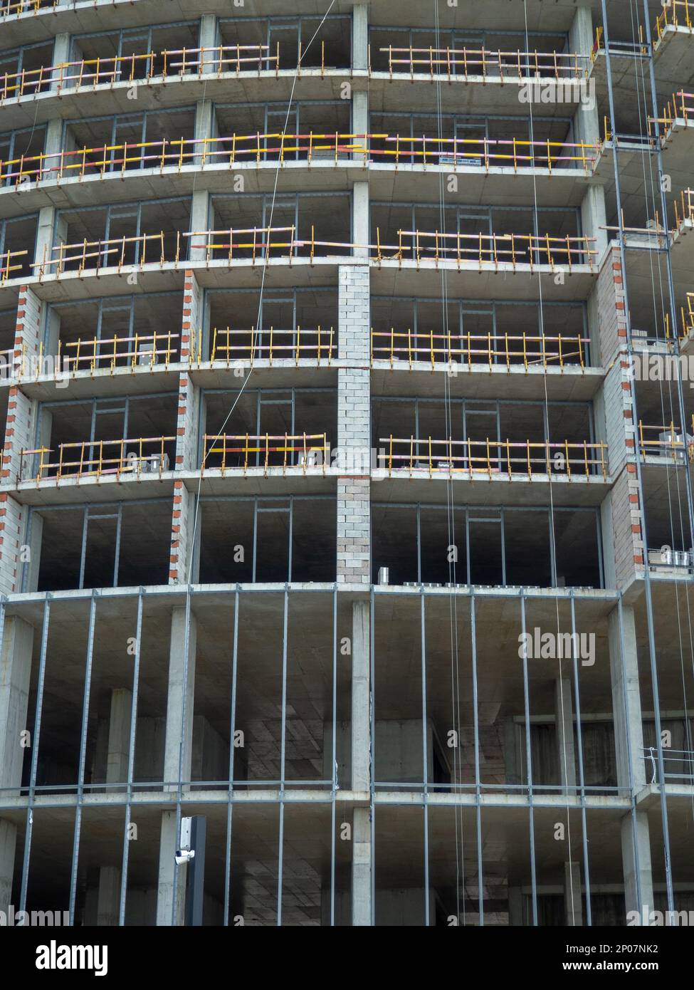 Construction of a modern hotel. The concrete frame of the hotel ...