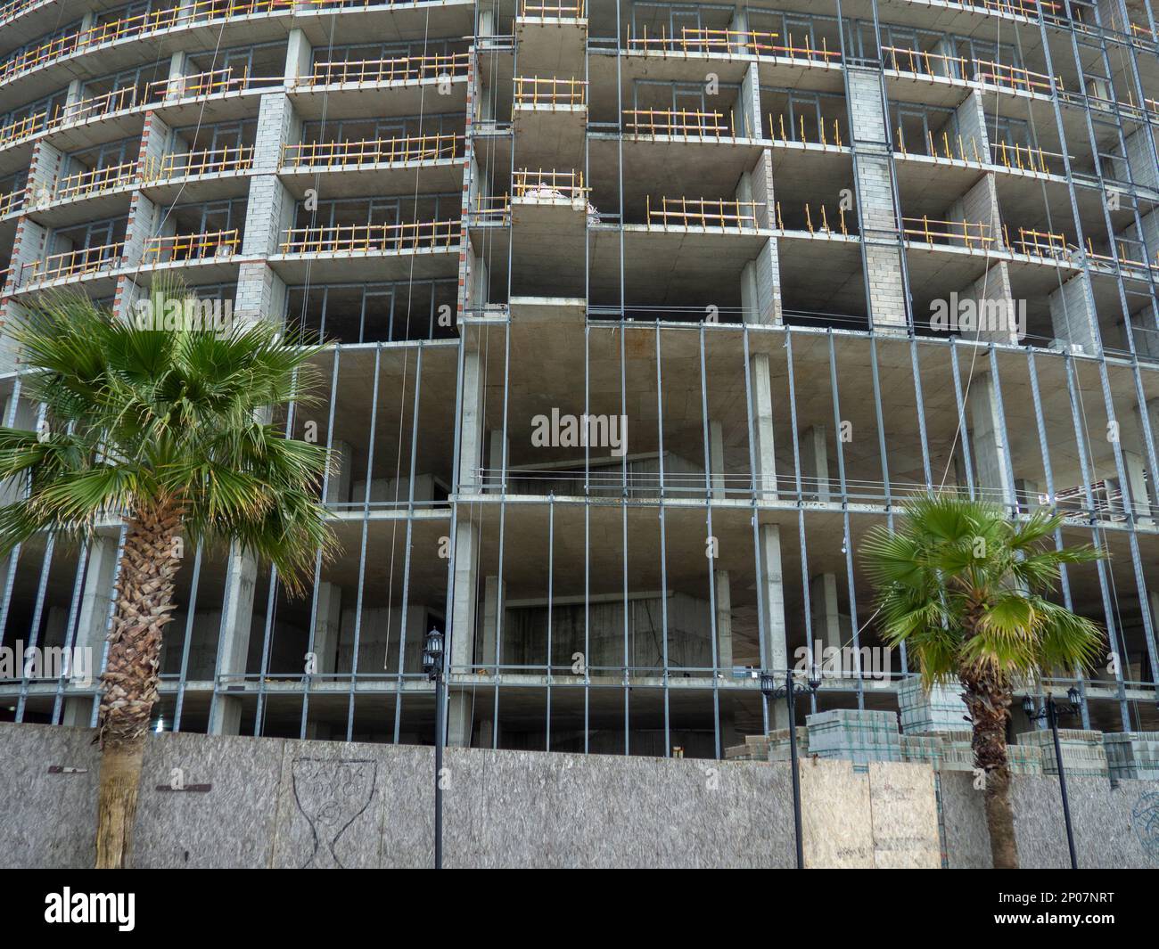 Construction of a modern hotel. The concrete frame of the hotel ...